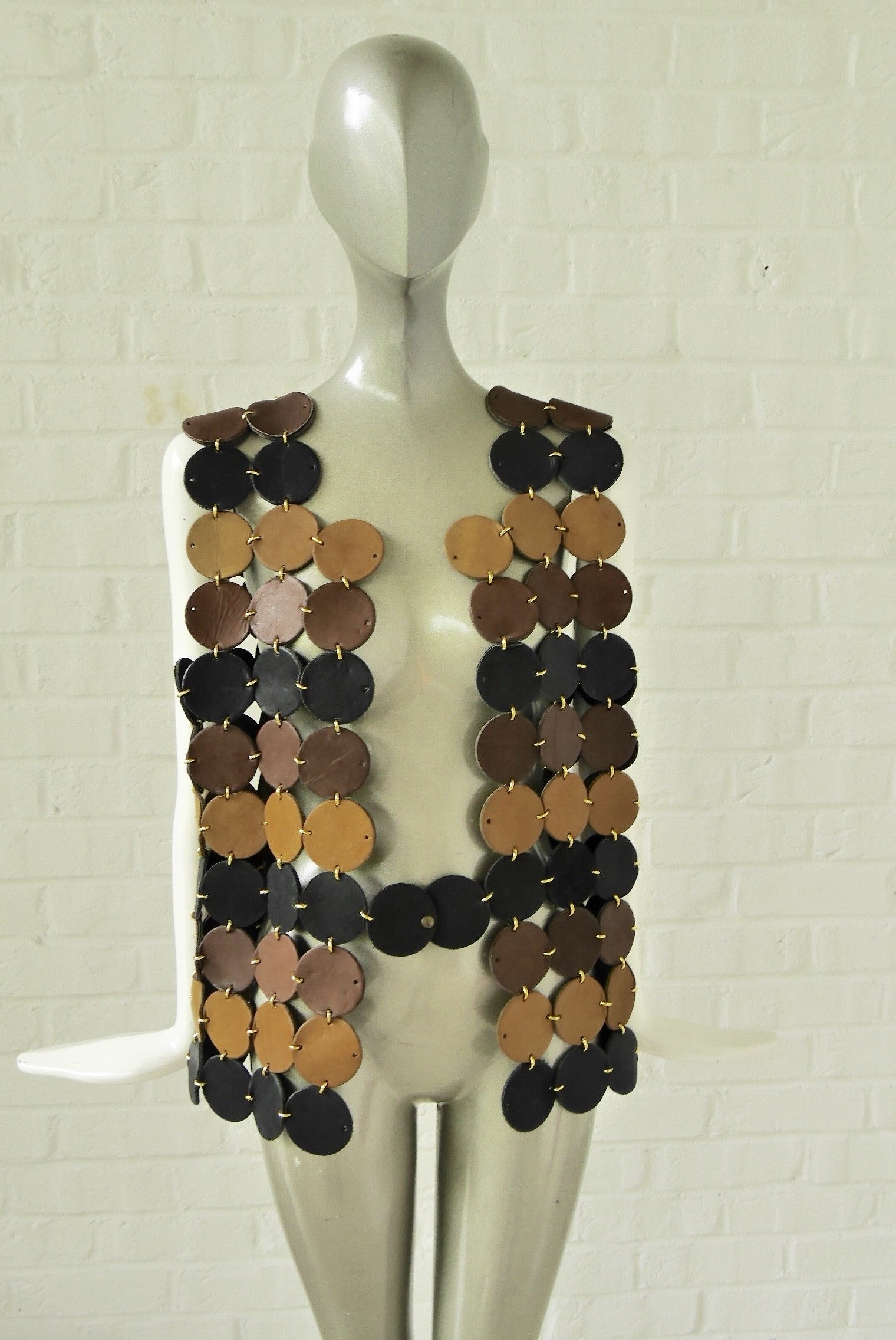 Paco Rabanne tooled leather vest. Hers 1970s – Vintage Le Monde